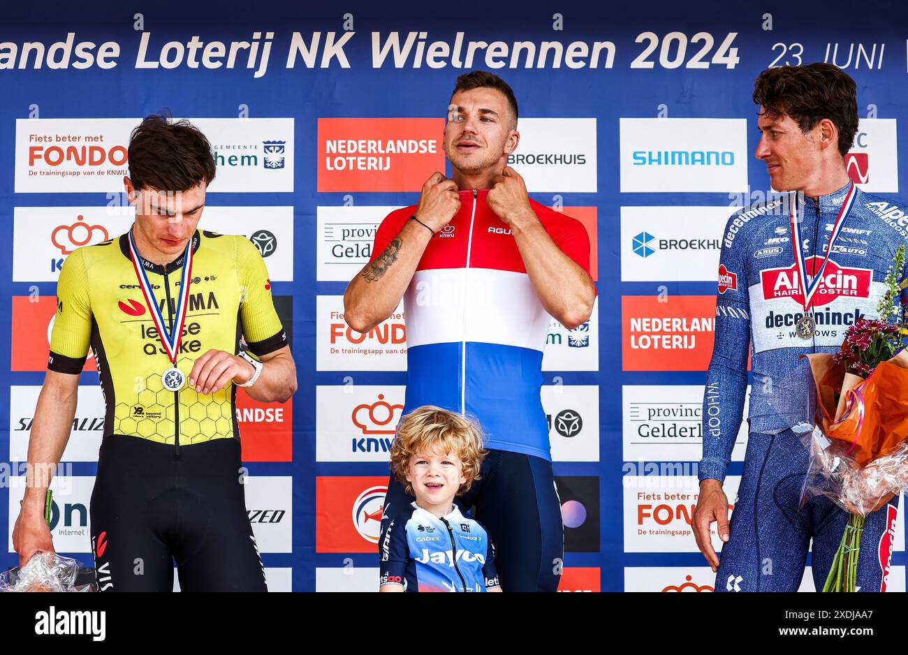 ARNHEM - (l-r) Olav Kooij (second, Dylan Groenewegen (first), Ramon Sinkeldam (third) on the ...