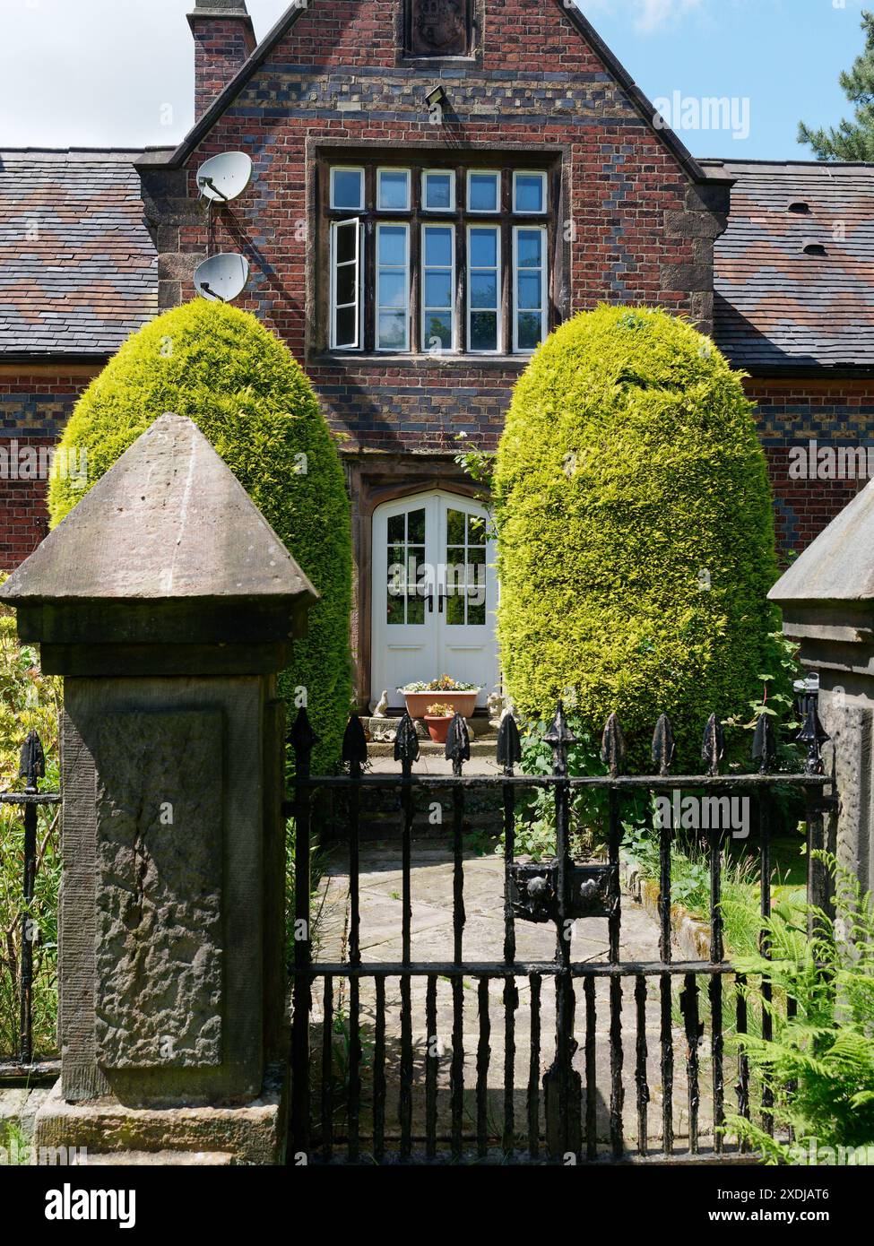 Historic house with entrance gate and well maintained beautiful garden ...