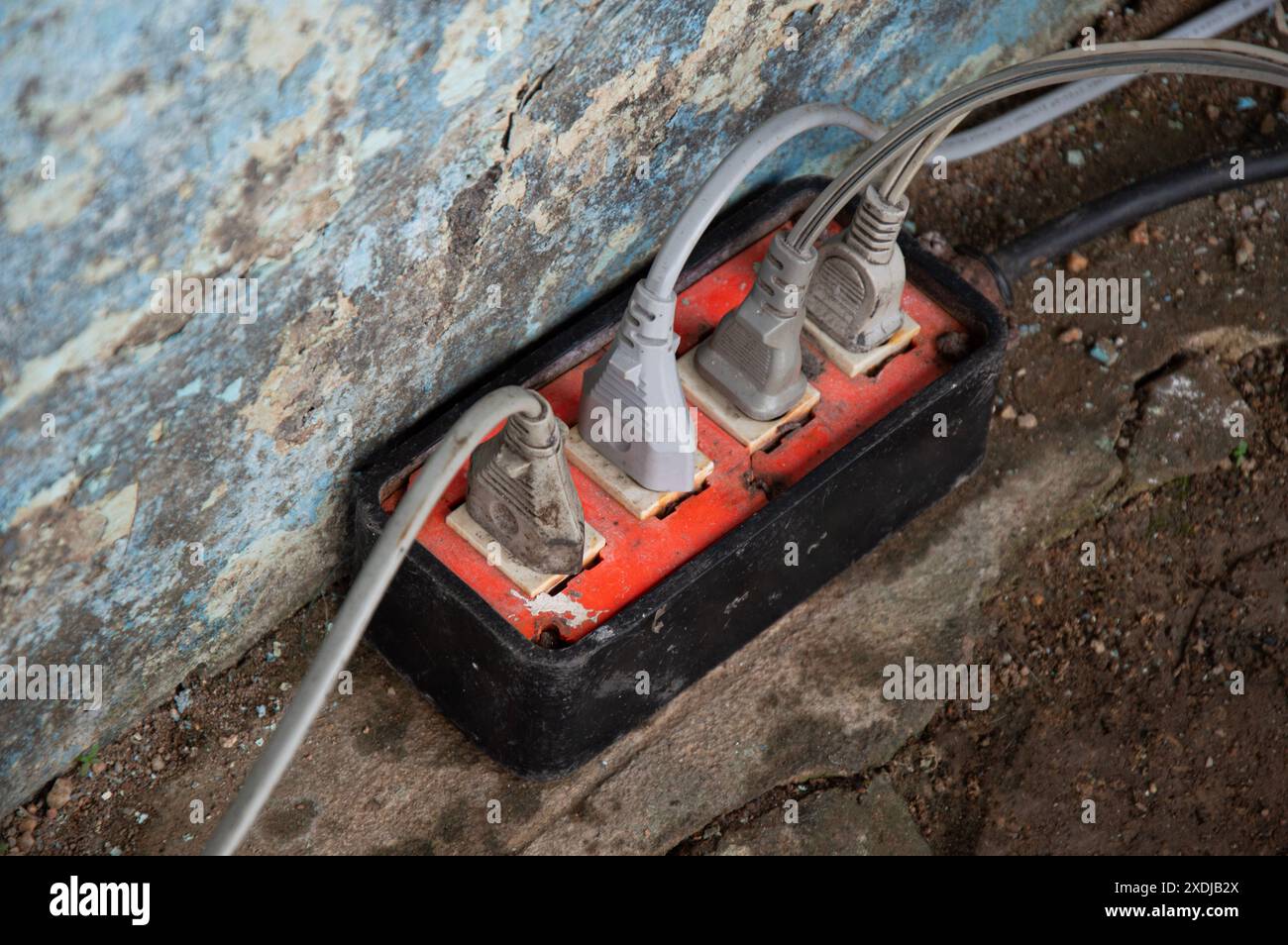 Old electrical plugs and sockets Placed on a damp surface, it may not ...