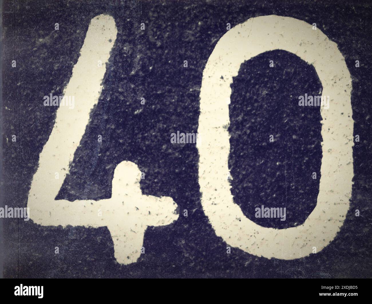 Number 40, White number on a dark background. Black and white old photo ...
