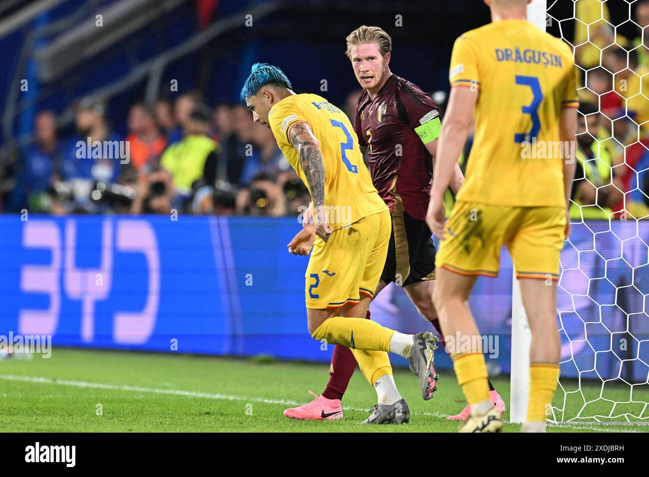 Andrei Ratiu (2) of Romania and Kevin De Bruyne (7) of Belgium pictured ...