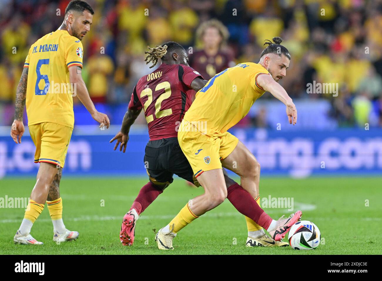 Marius Marin (6) of Romania and Radu Dragusin (3) of Romania defending ...