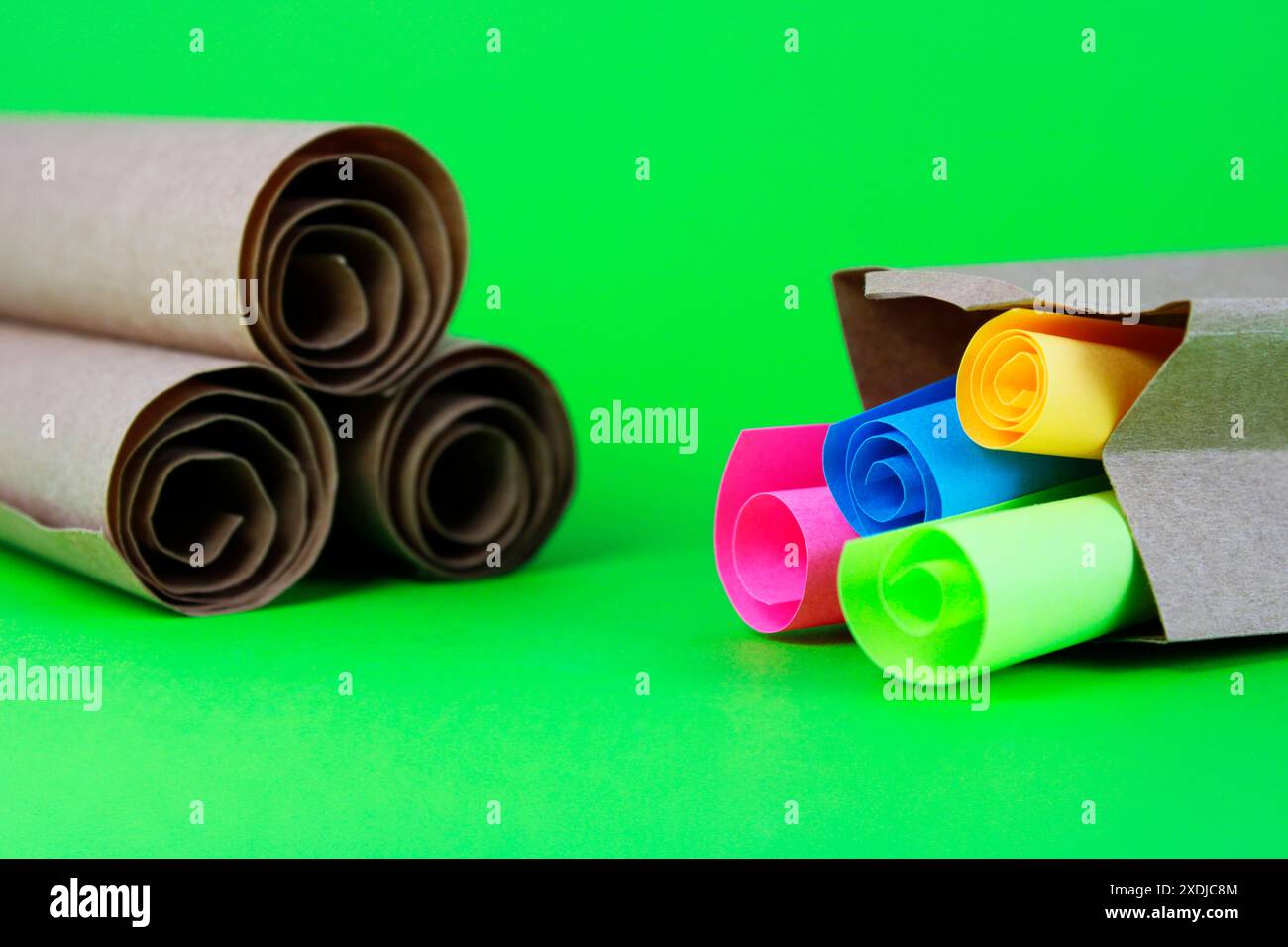 Craft paper rolls and bag with others of different color Stock Photo ...