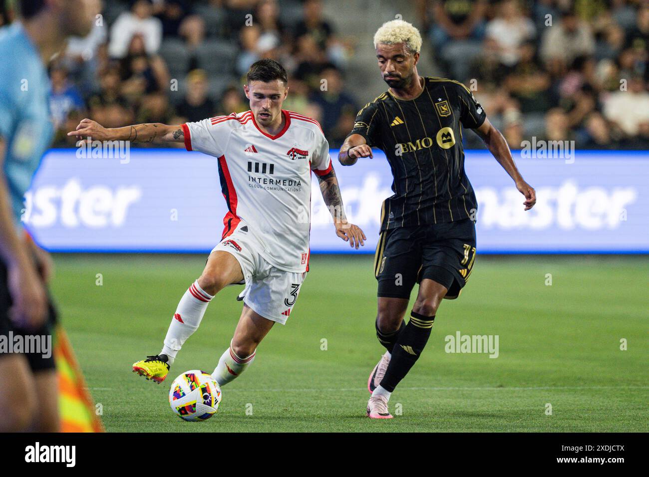 San Jose Earthquakes defender Paul Marie (3) is defended by LAFC ...