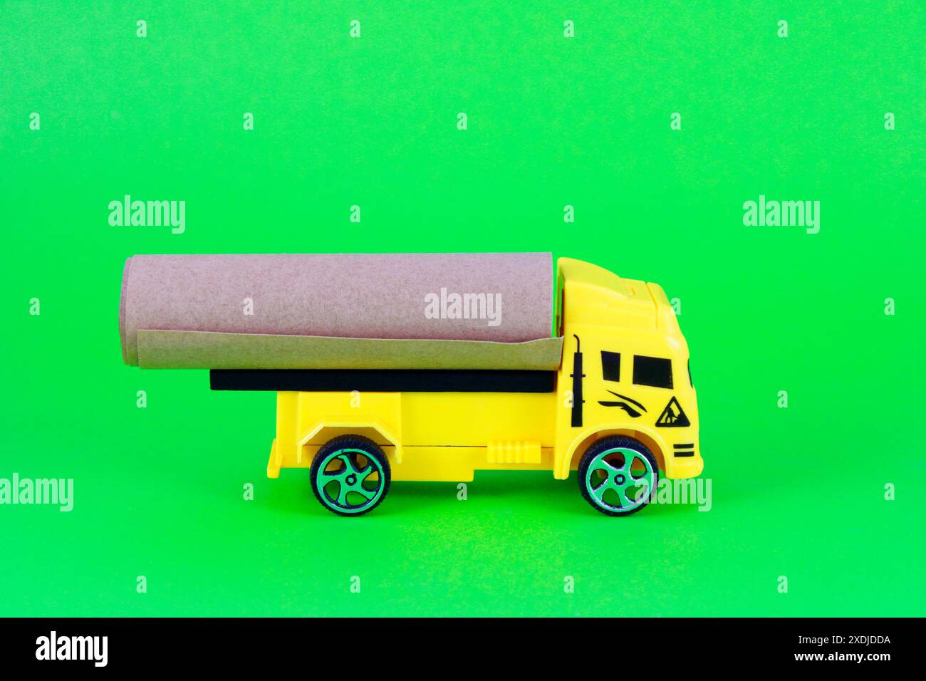 Truck transporting roll of recycled craft paper Stock Photo - Alamy