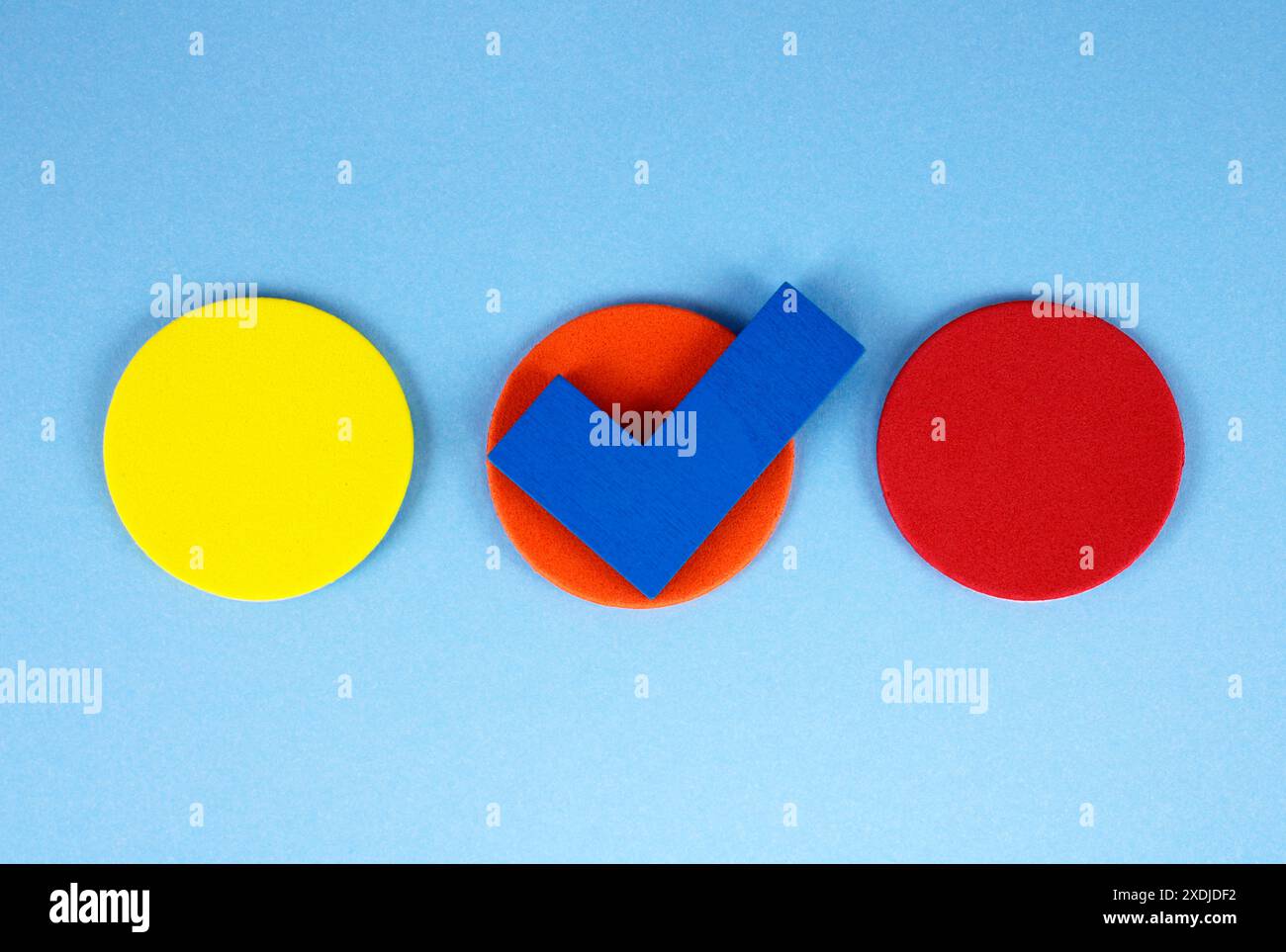 Check sign selecting one of three color options Stock Photo - Alamy