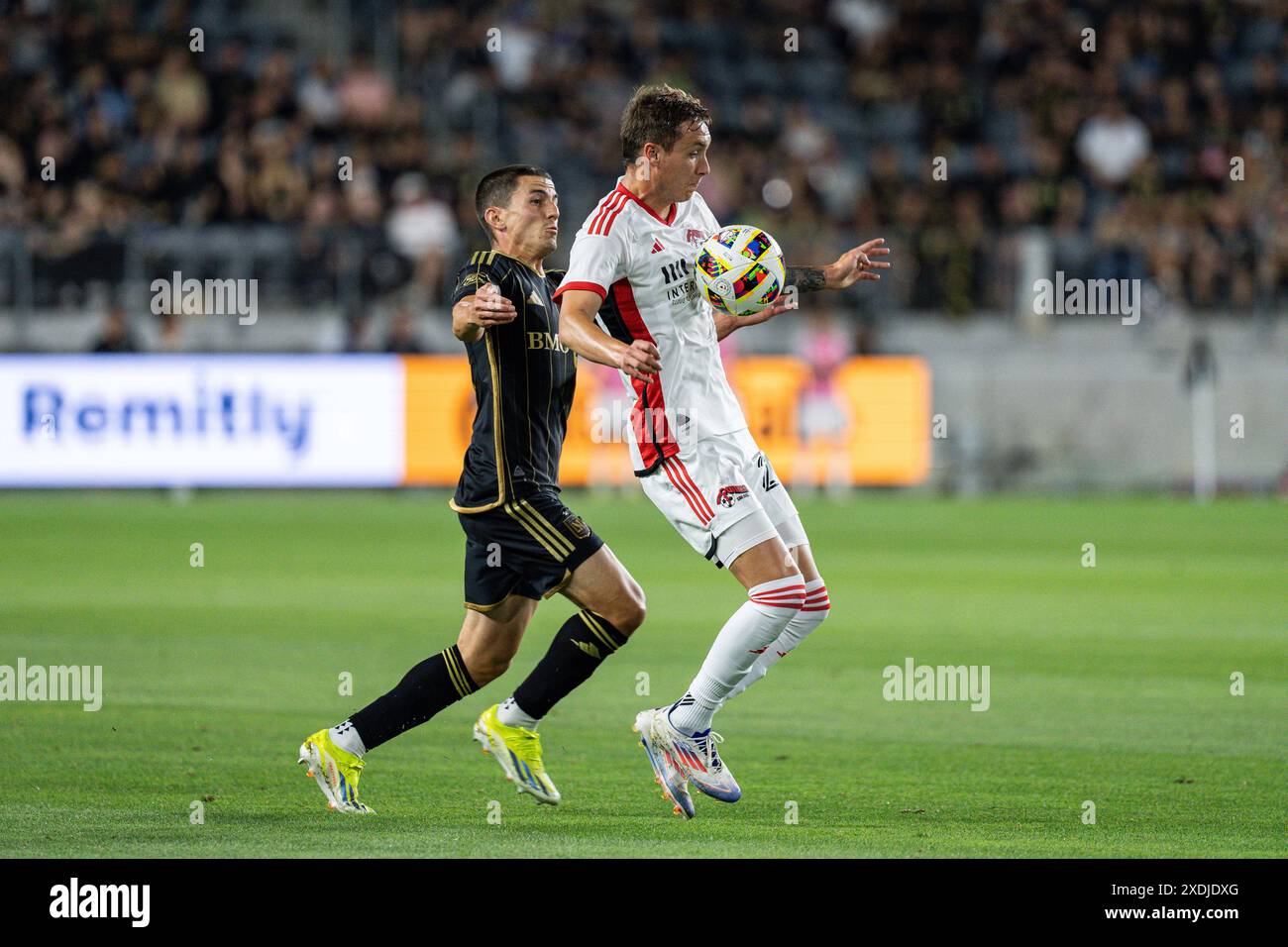 San Jose Earthquakes defender Daniel Munie (24) is defended by LAFC ...