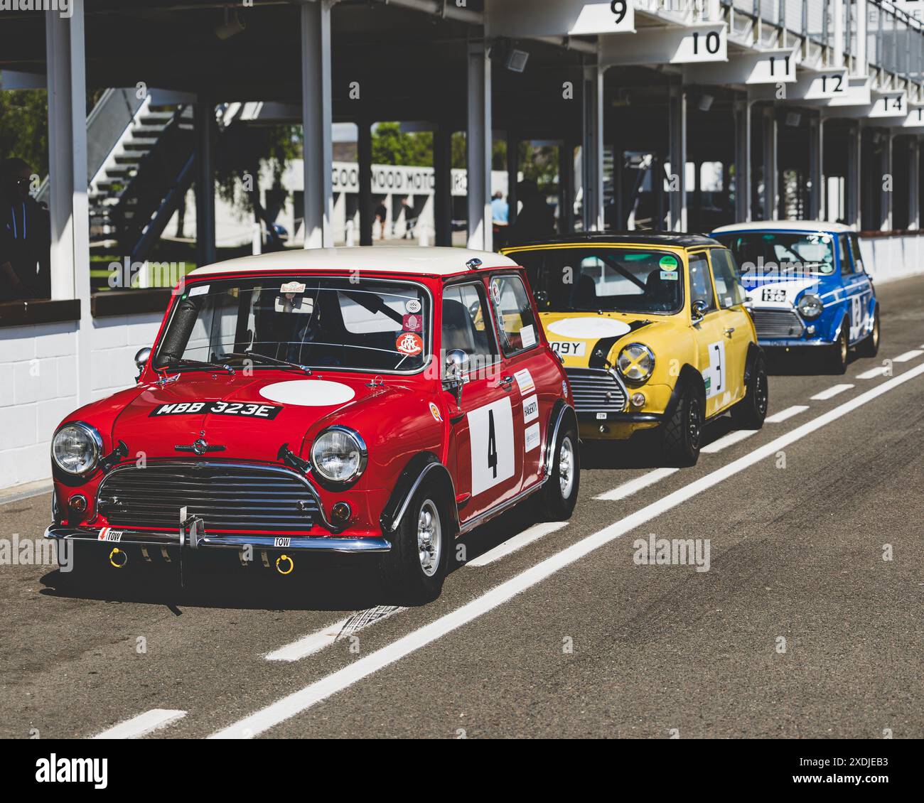 Three racing Minis at Goodwood Stock Photo - Alamy