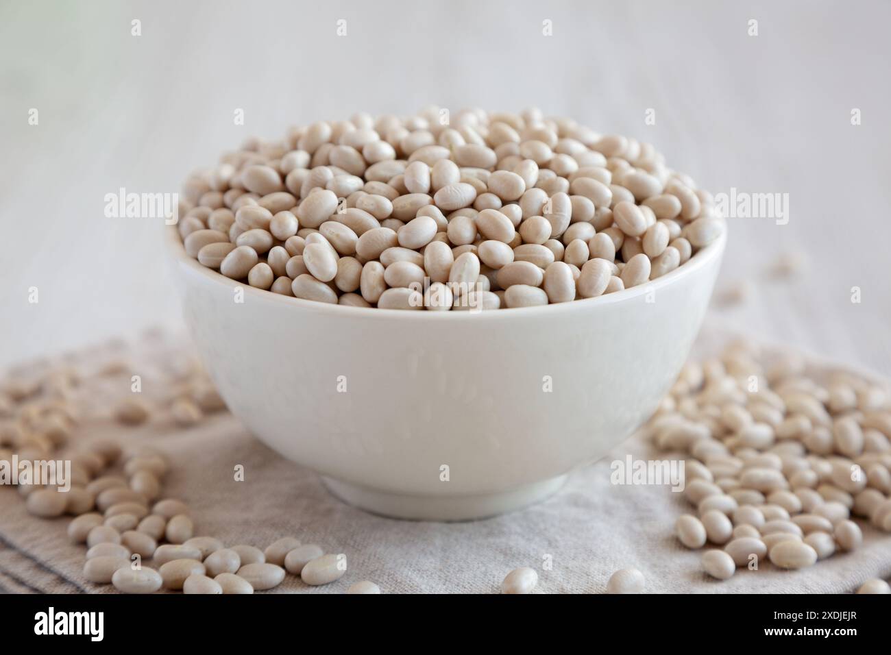 Organic White Beans in a Bowl, side view Stock Photo - Alamy