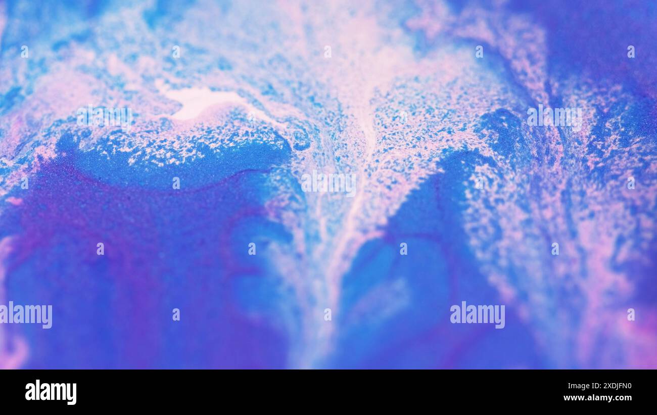 Ink drip. Sparkling fluid flow. Defocused purple blue pink color shiny ...