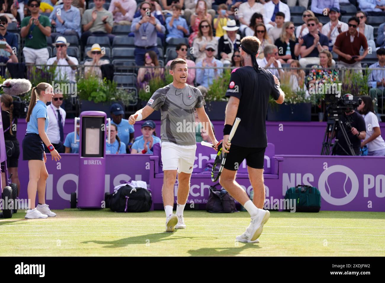 Michael Venus (right) and Neal Skupski (left) celebrate winning after ...