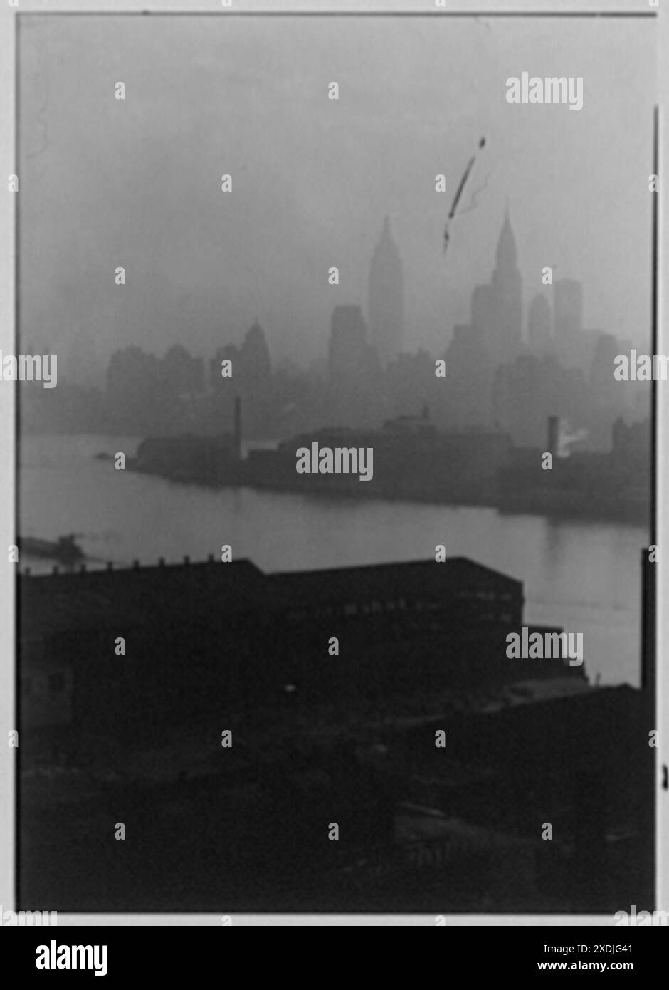 New York city views. Midtown through mist, from Queensboro Bridge ...