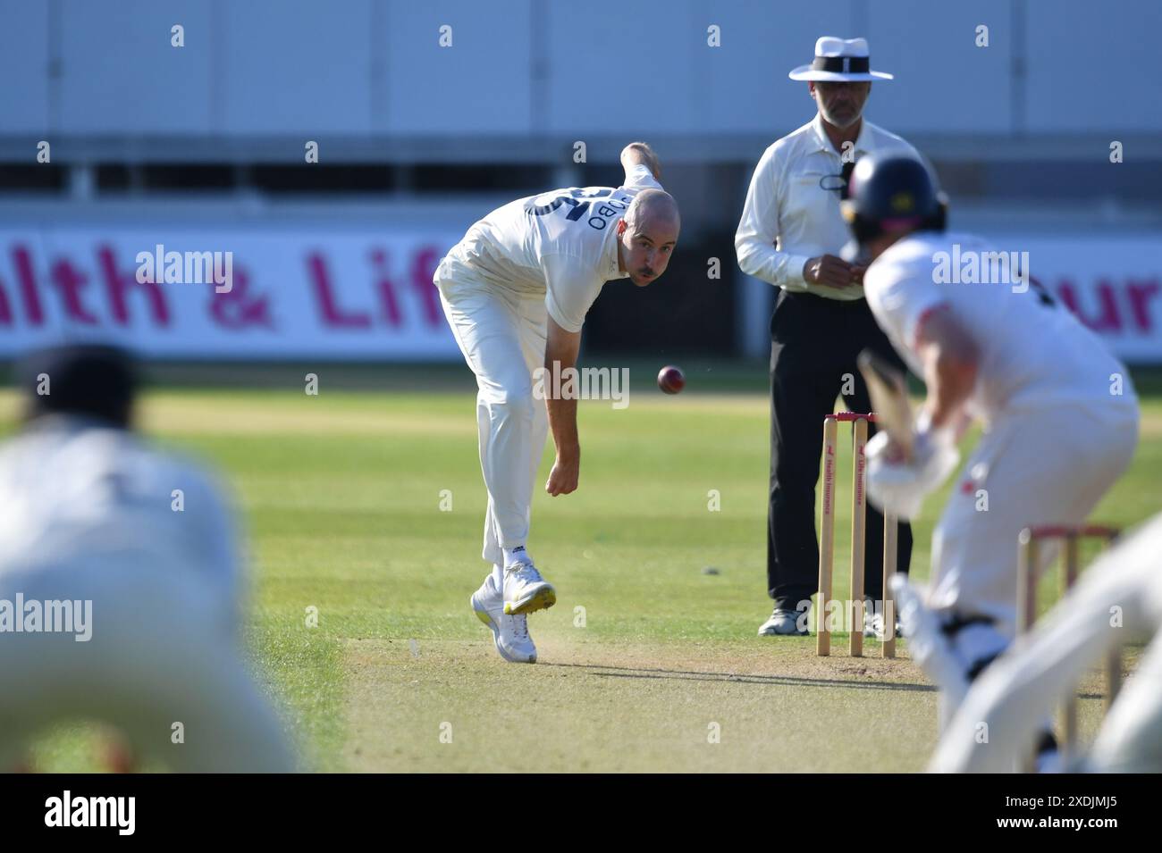Canterbury, England. 23rd Jun 2024. Charlie Stobo bowls during day one ...