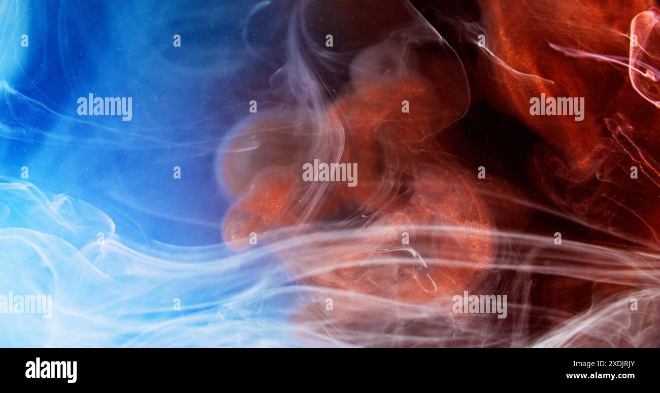 Color smoke. Paint water splash. Defocused red blue vapor cloud glitter ...