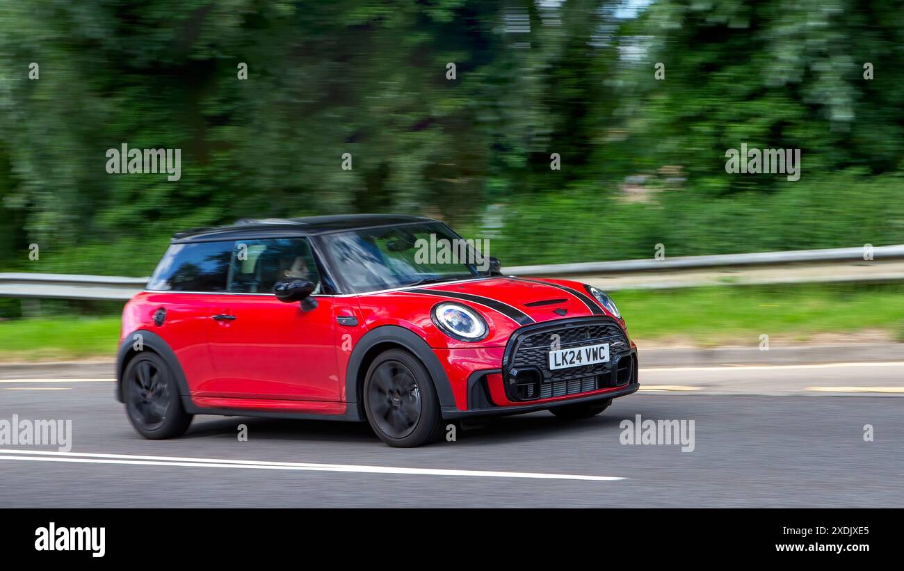 Milton Keynes,UK - June 22nd 2024: 2024 red Mini Cooper S car driving ...