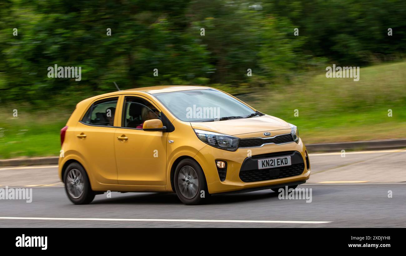 Milton Keynes,UK - June 23rd 2024: 2021 yellow Kia Picanto car driving ...