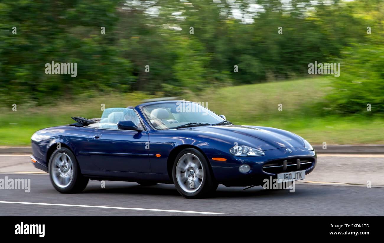 Milton Keynes,UK - June 21st 2024: 2000 blue Jaguar XK8 classic car ...