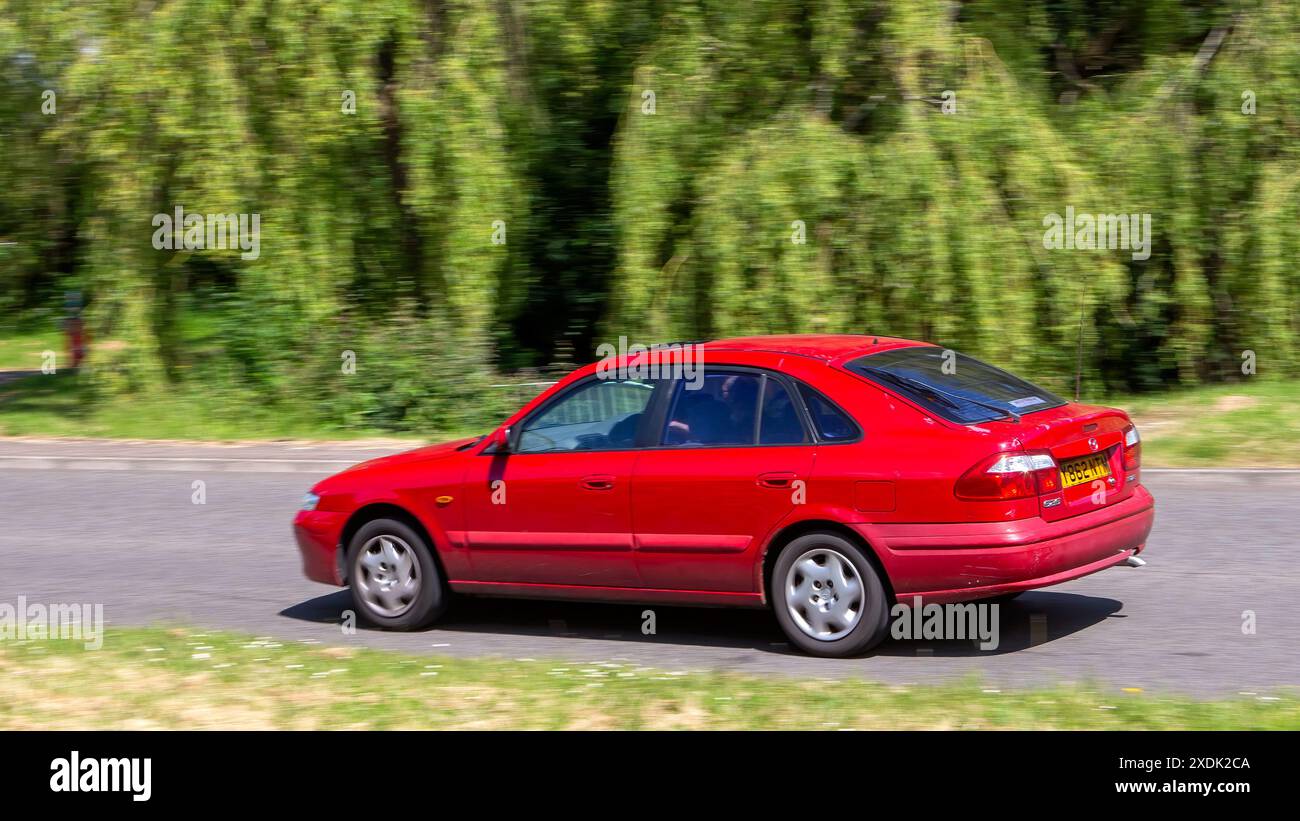 Milton Keynes,UK - June 21st 2024: 2001 red Mazda 626 classic car ...