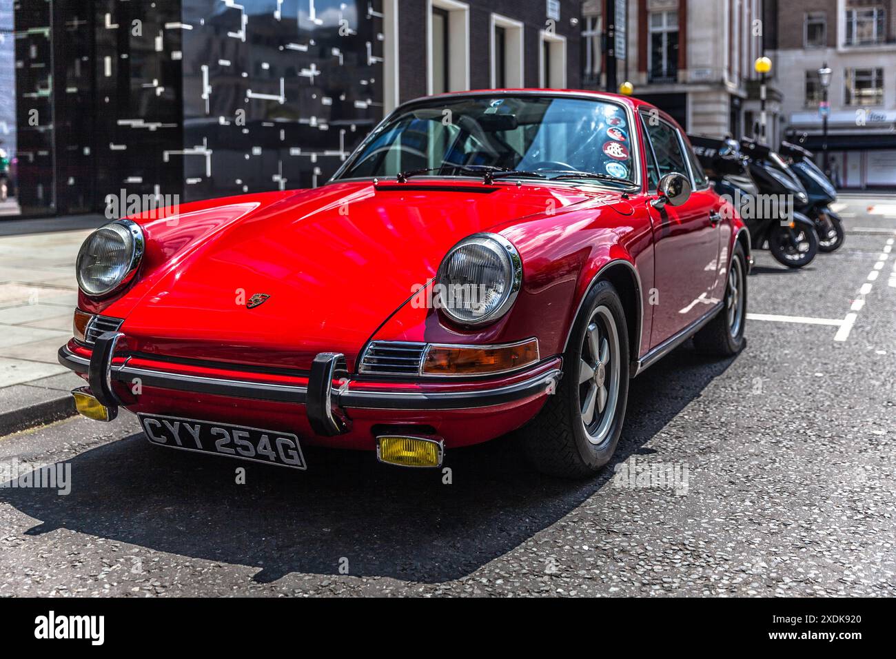 Red Porsche automobile parked on street, London, England, UK Stock ...