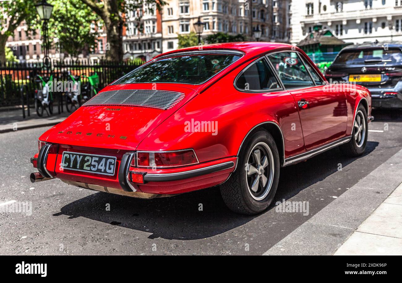 Red Porsche automobile parked on street, London, England, UK Stock ...