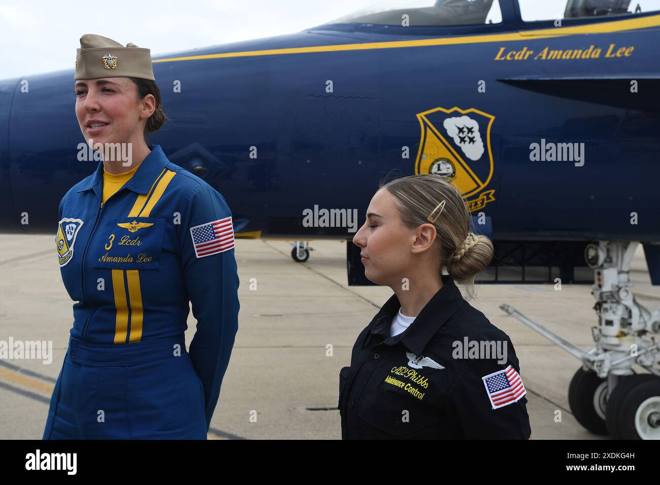 Lt. Commander Amanda Lee and AL2 Phibbs next to Blue Angel 3 F/A-18 ...