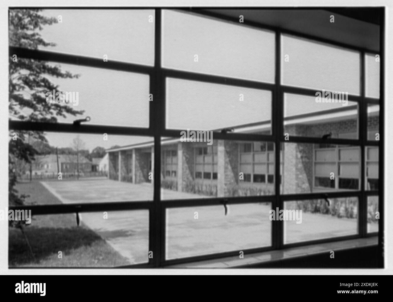 East Hills School, Roslyn, New York. View through window, to swing ...
