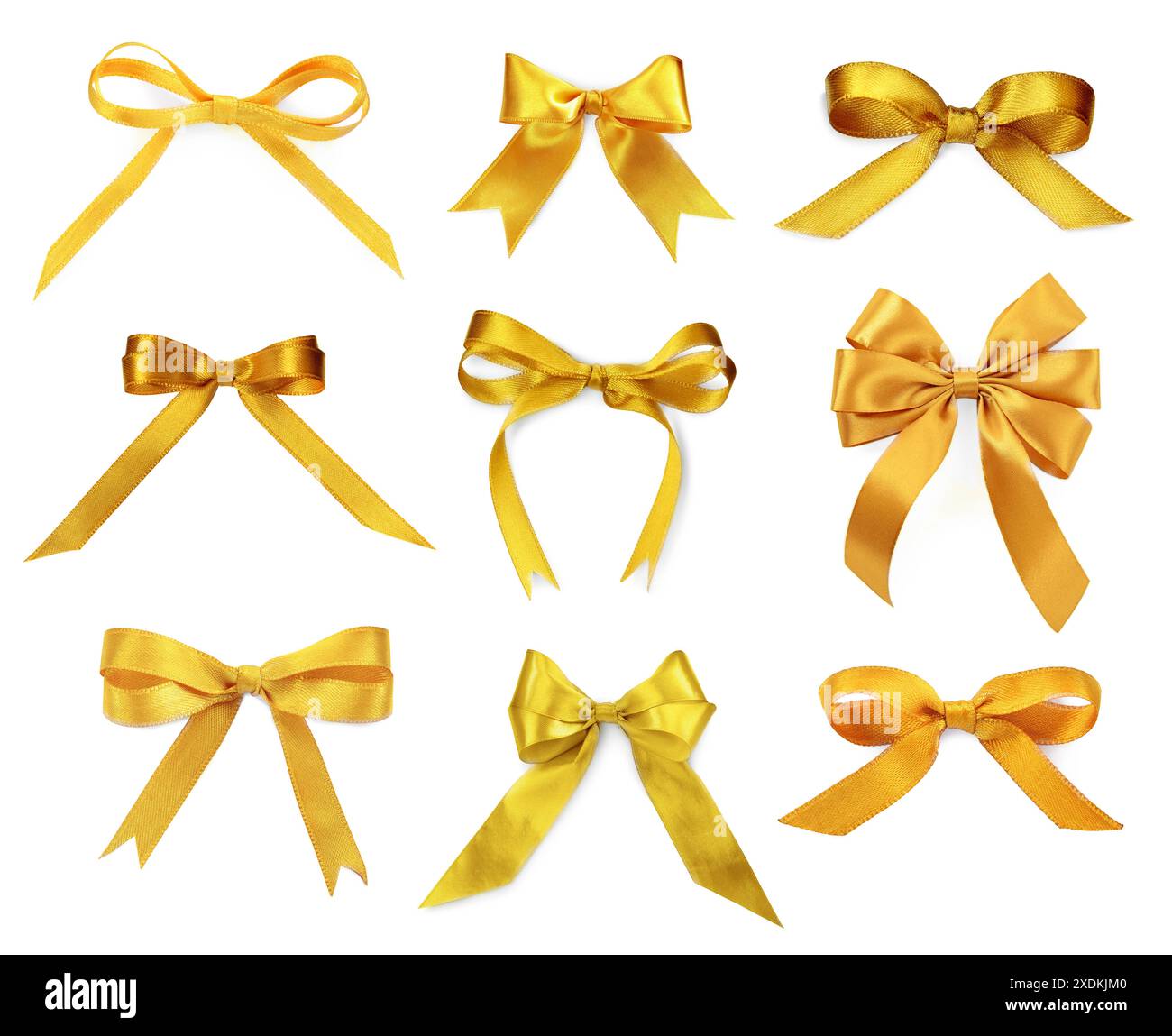 Beautiful golden bows isolated on white, set Stock Photo - Alamy
