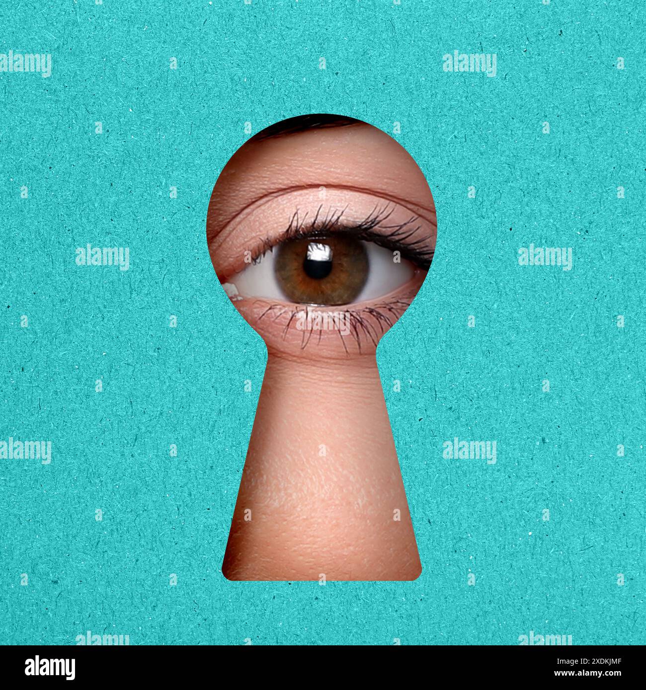 Woman looking through keyhole in light blue surface Stock Photo - Alamy