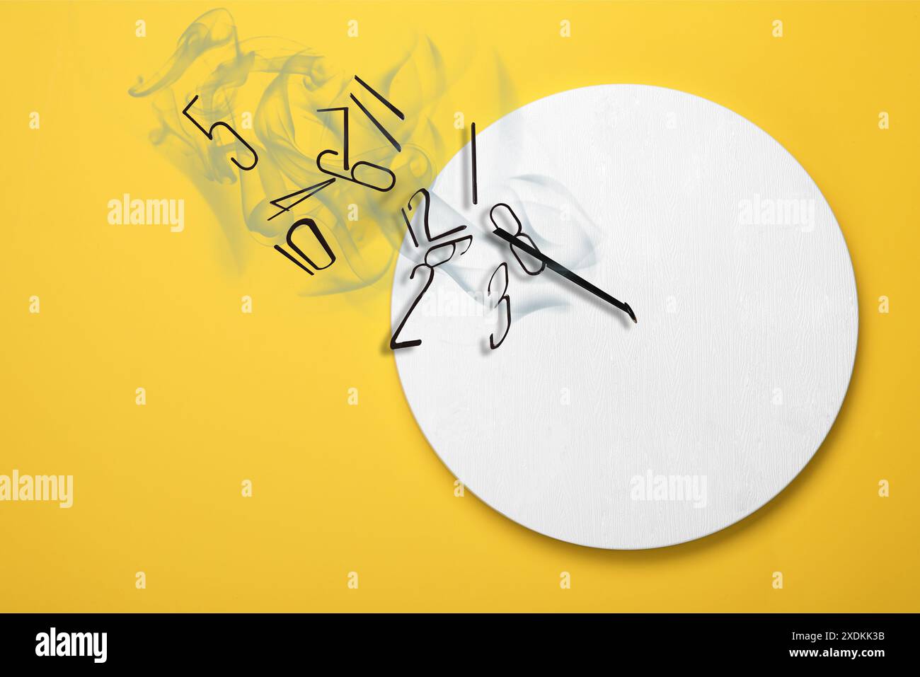 Numerals and hands flying away from clock on yellow background. Time is ...