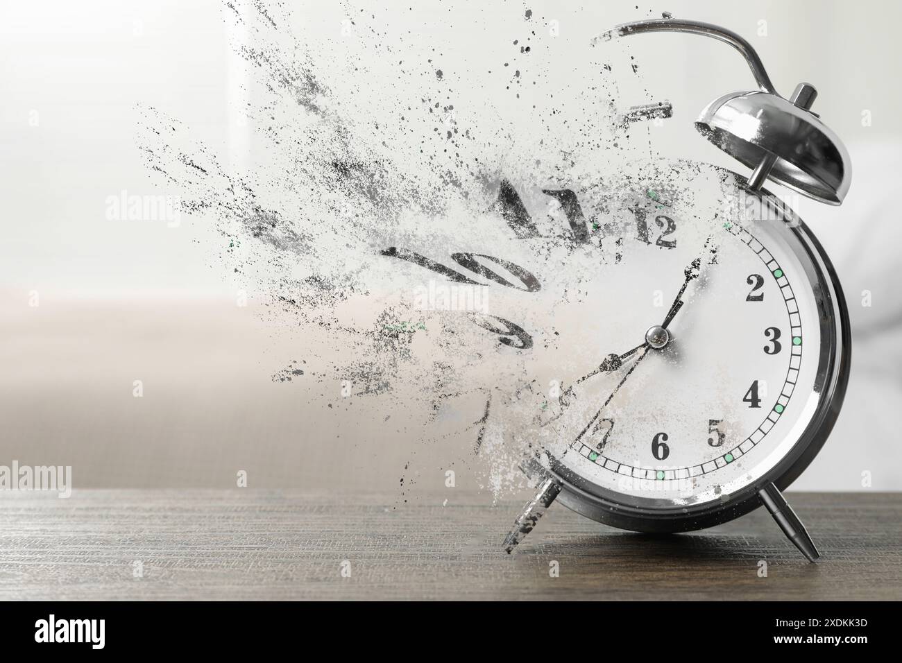 Hand holding clock dissolving hi-res stock photography and images - Alamy