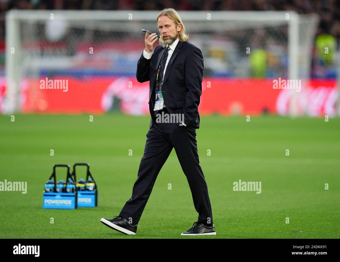 Scotland assistant coach Austin MacPhee inspects the pitch ahead of the ...
