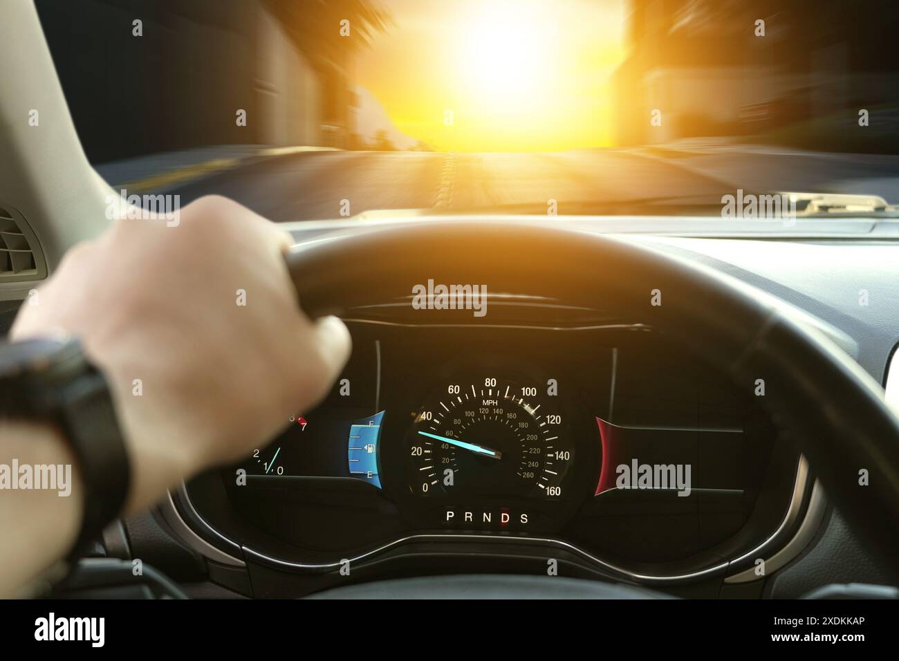 Man driving car with one hand on steering wheel, closeup Stock Photo ...