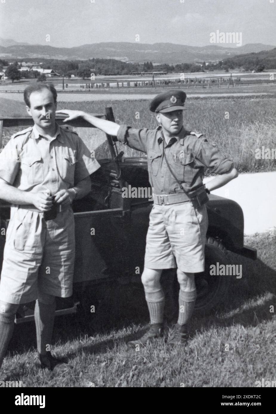 Royal Engineers officers next to an early army Land Rover, c. 1950s ...