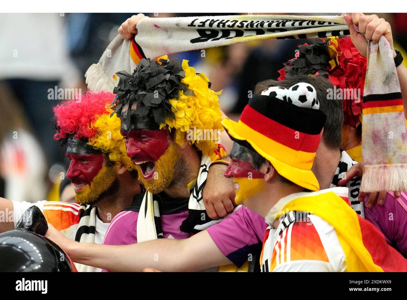 Fans shout before a Group A match between Switzerland and Germany at ...