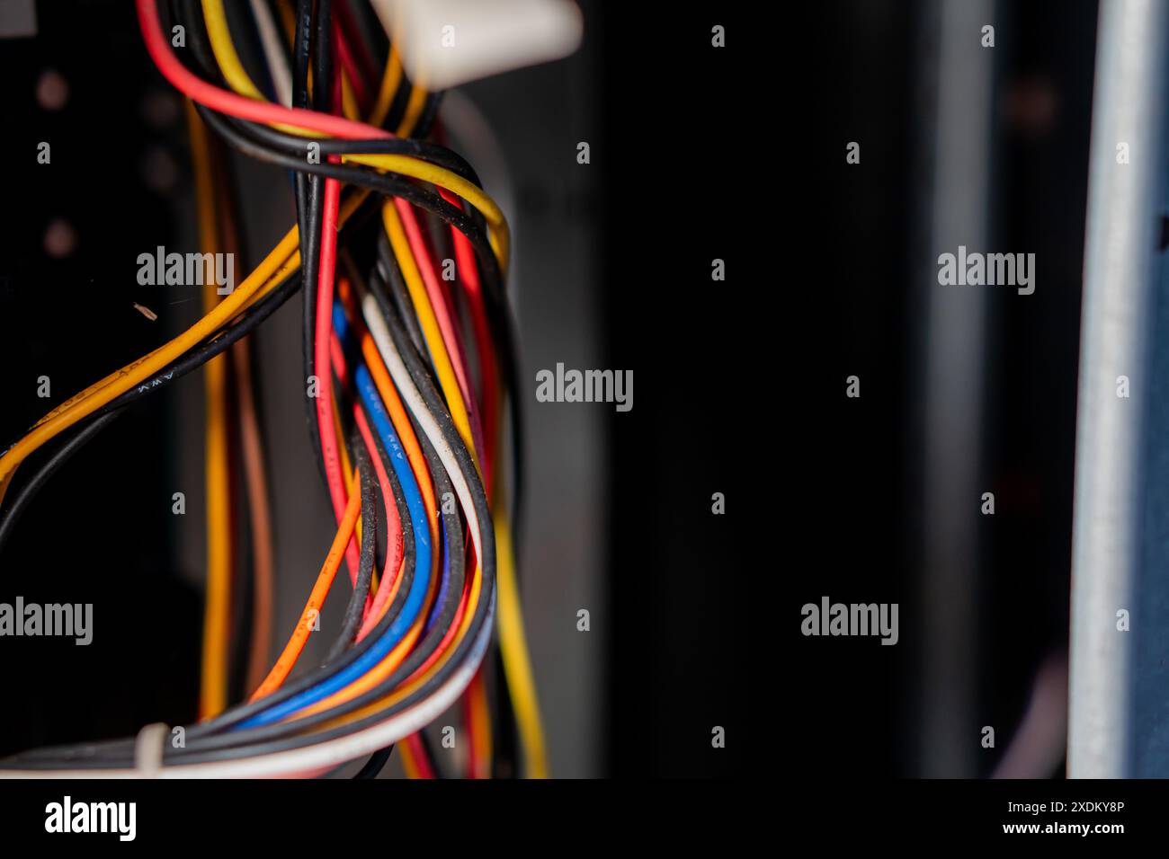 Close-up of colorful electrical wires inside a computer or electronic ...