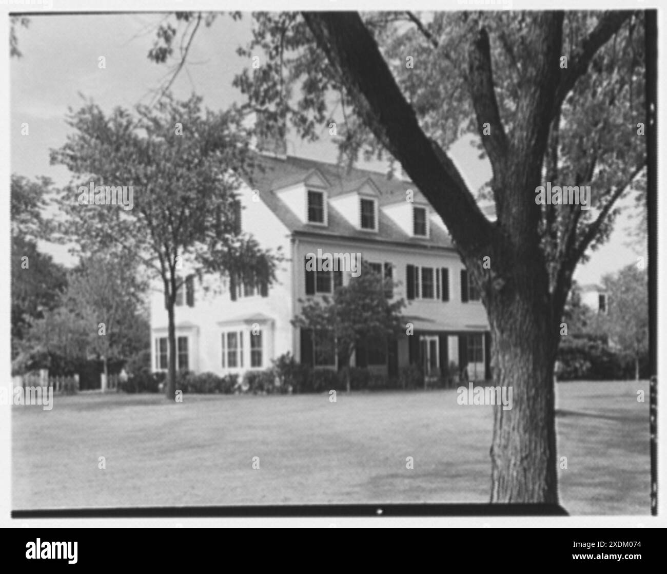 Mrs. Harold I. Pratt, residence on Shutter Lane, Oyster Bay, Long Island. West and south facades ...