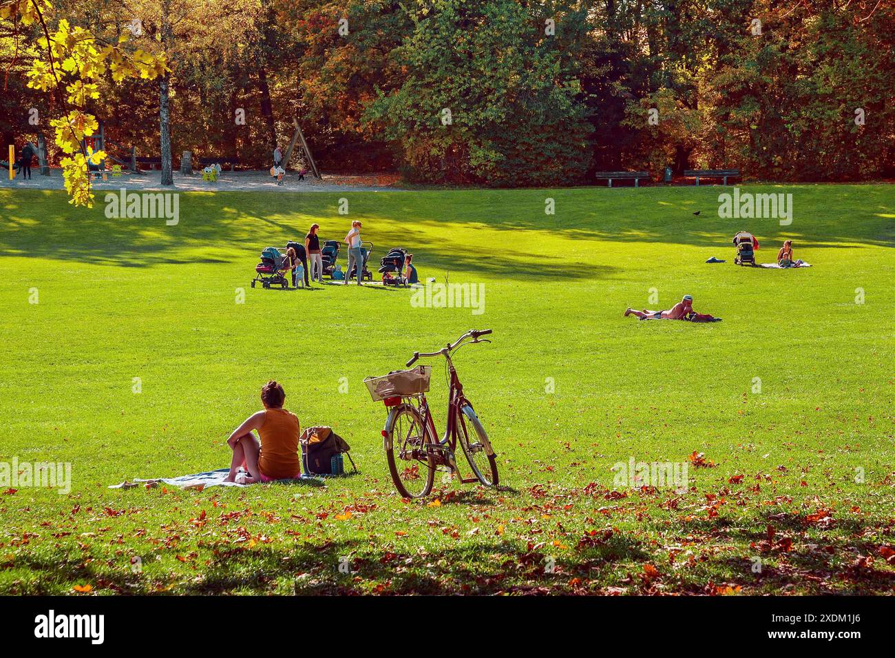 Visitors sunbathe in Bavariapark, Munich, Upper Bavaria, Bavaria ...