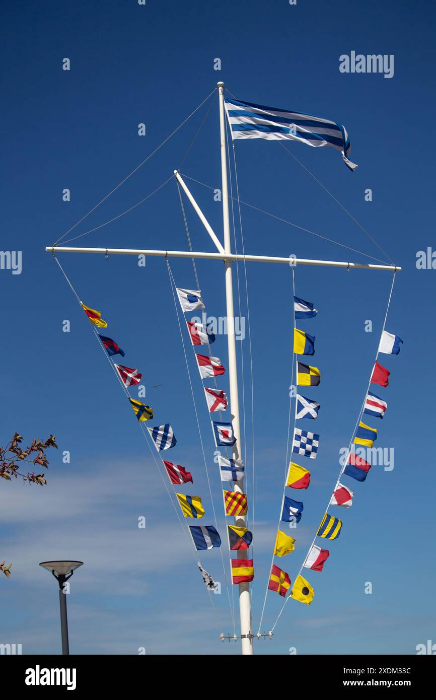 Nautical flags fluttering in the wind. Colorful signal flags Stock ...