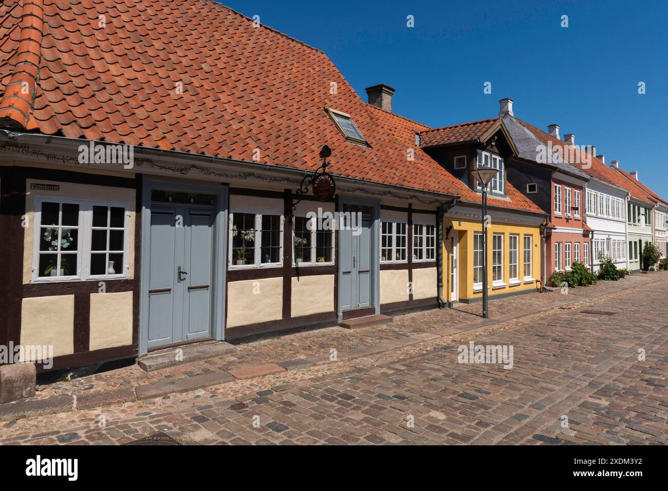 Odense, cobblestone street in the old town, half-timbered house ...