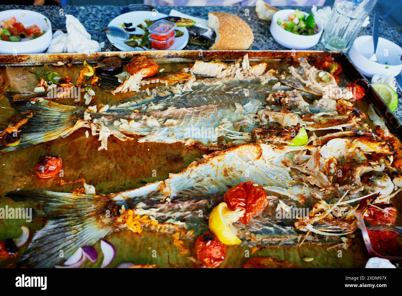 Leftover fish hi-res stock photography and images - Alamy