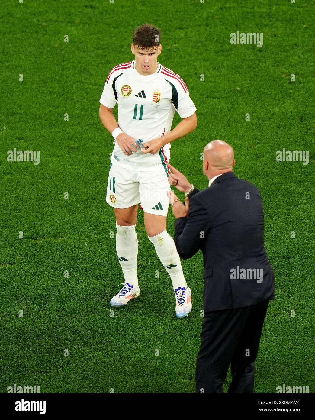 Hungary's Milos Kerkez (left) speaks with Hungary manager Marco Rossi ...