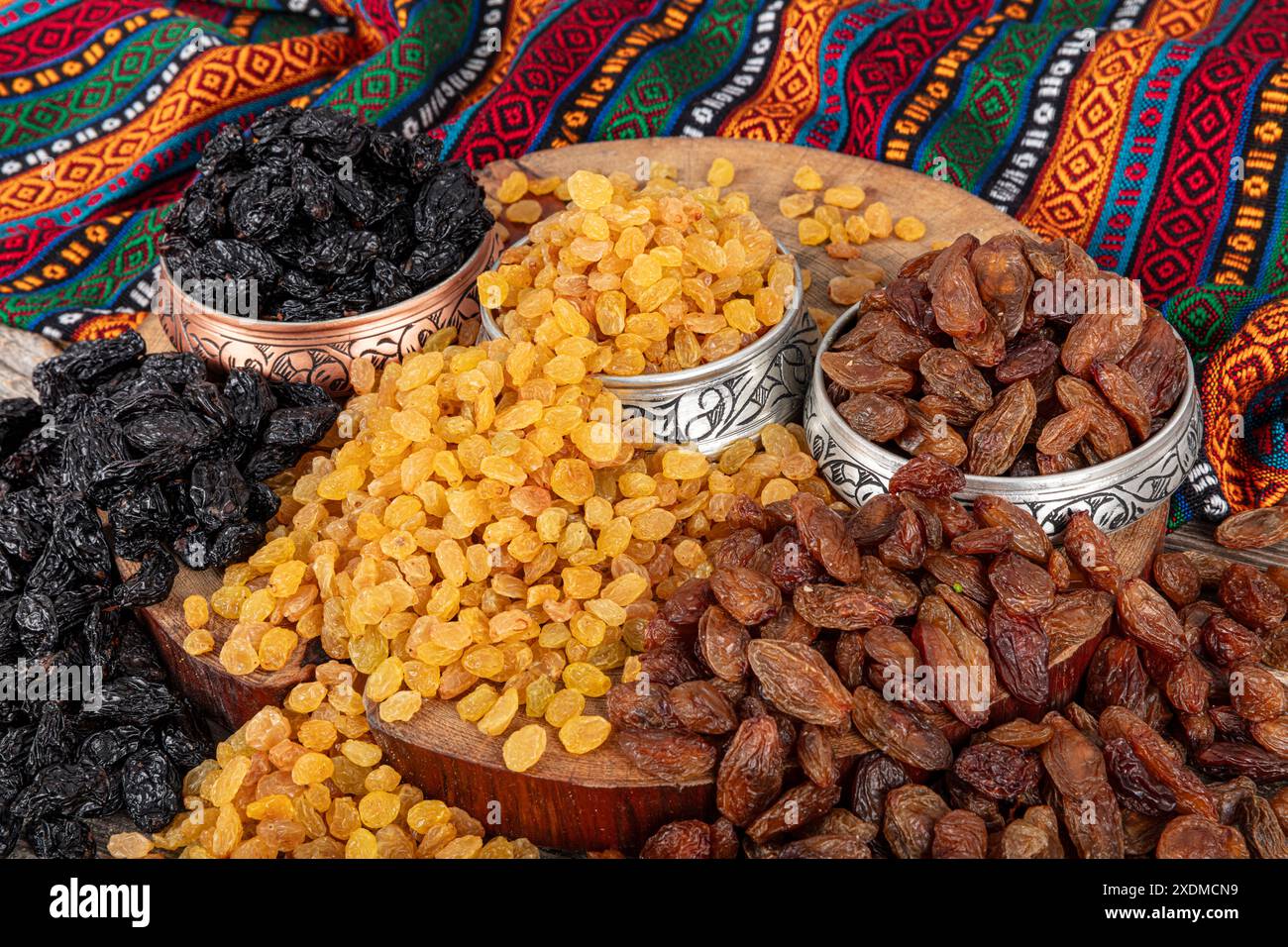 Collection of raisins that offers a vibrant and nutritious array. Three ...