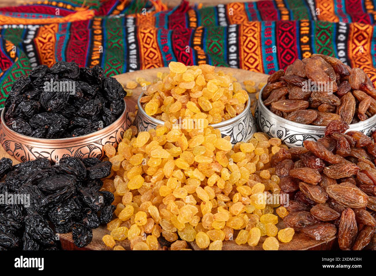 Collection of raisins that offers a vibrant and nutritious array. Three ...