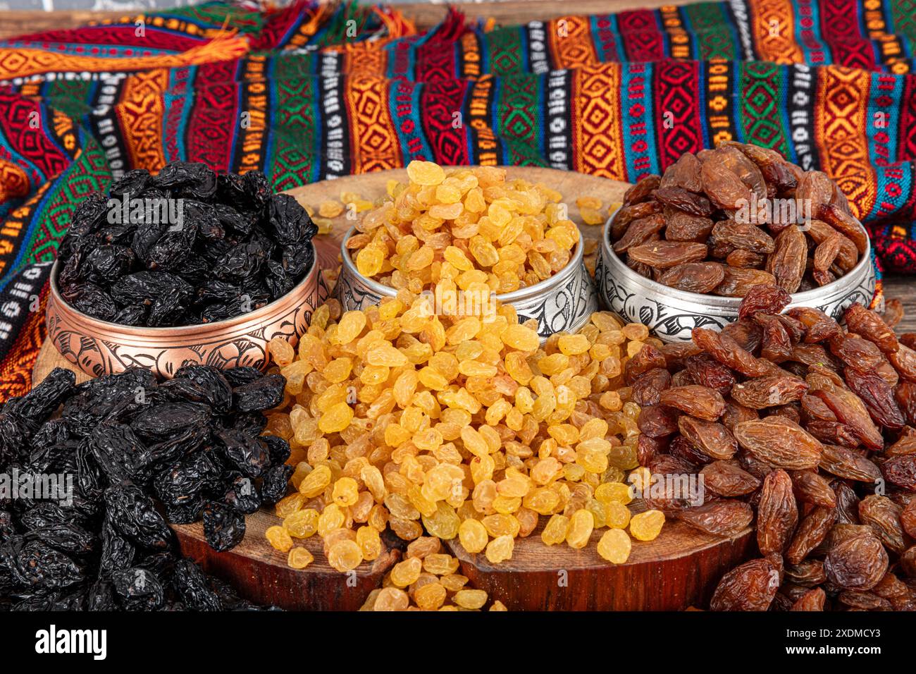 Collection of raisins that offers a vibrant and nutritious array. Three ...