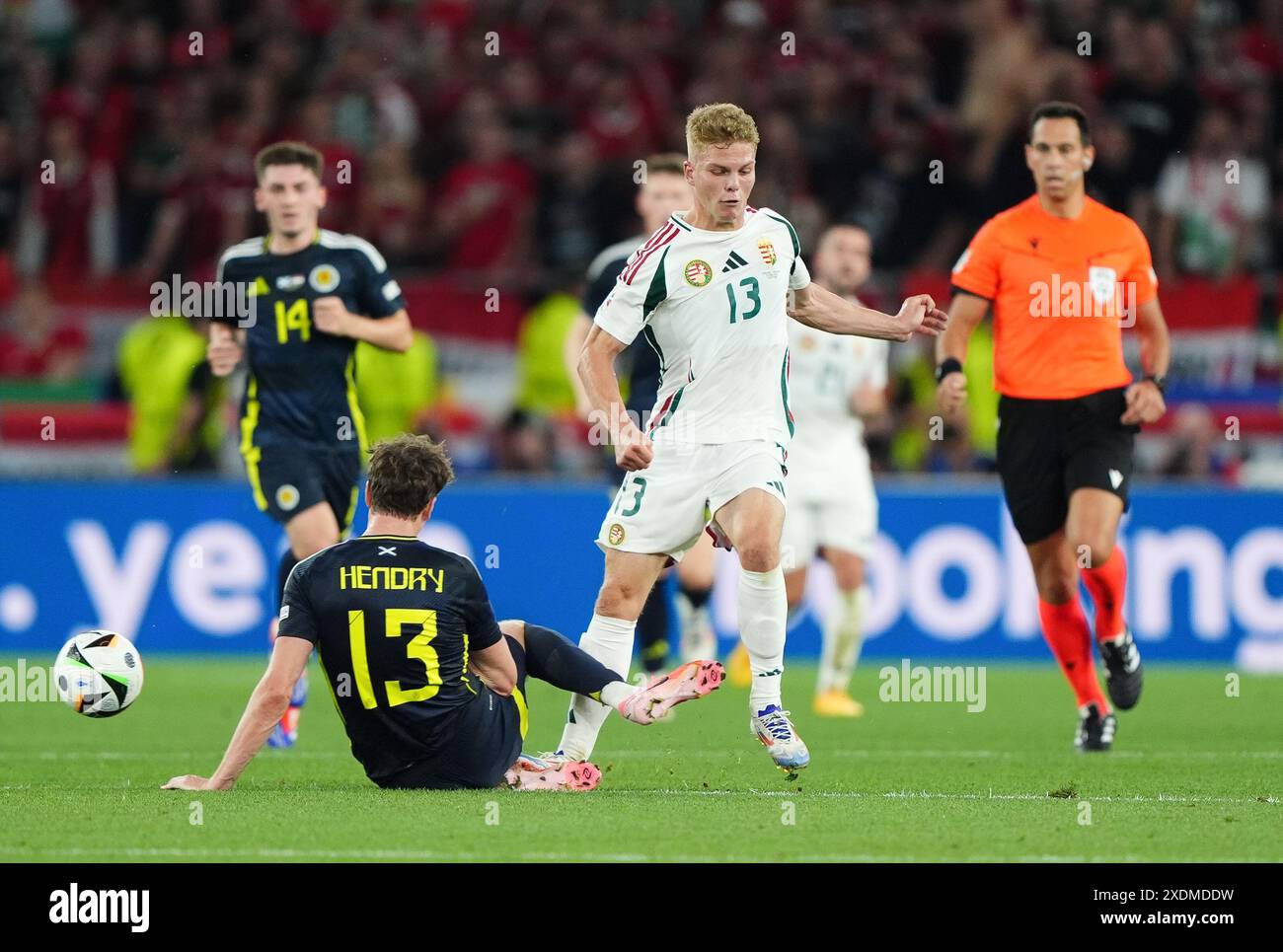 Hungary's Andras Schafer fouls Scotland's Jack Hendry (left) and is ...