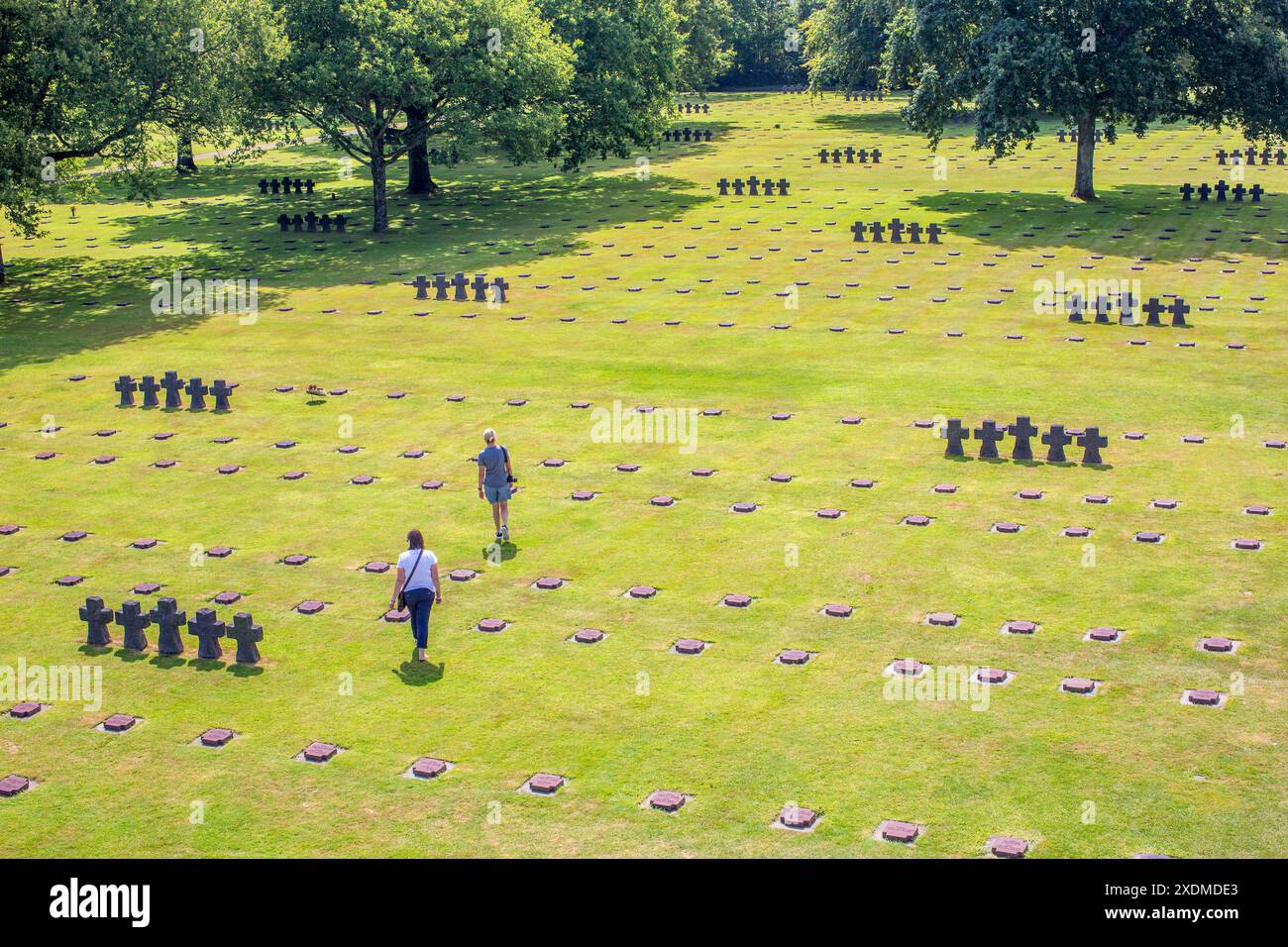 German military cemetery in Normandy, France with visitors reflecting ...
