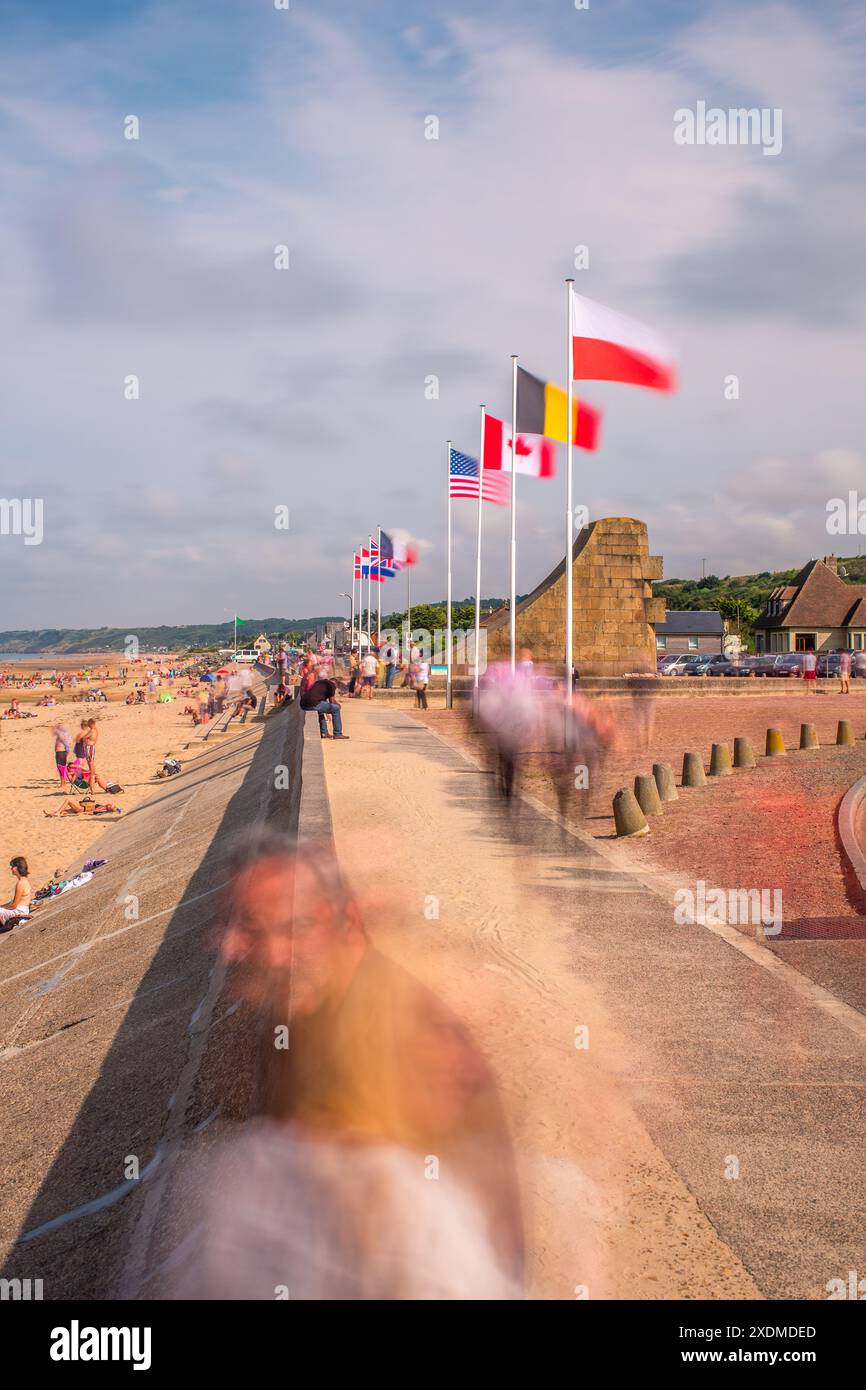 Long exposure photograph of the promenade at Omaha Beach in Normandy, France, featuring various ...