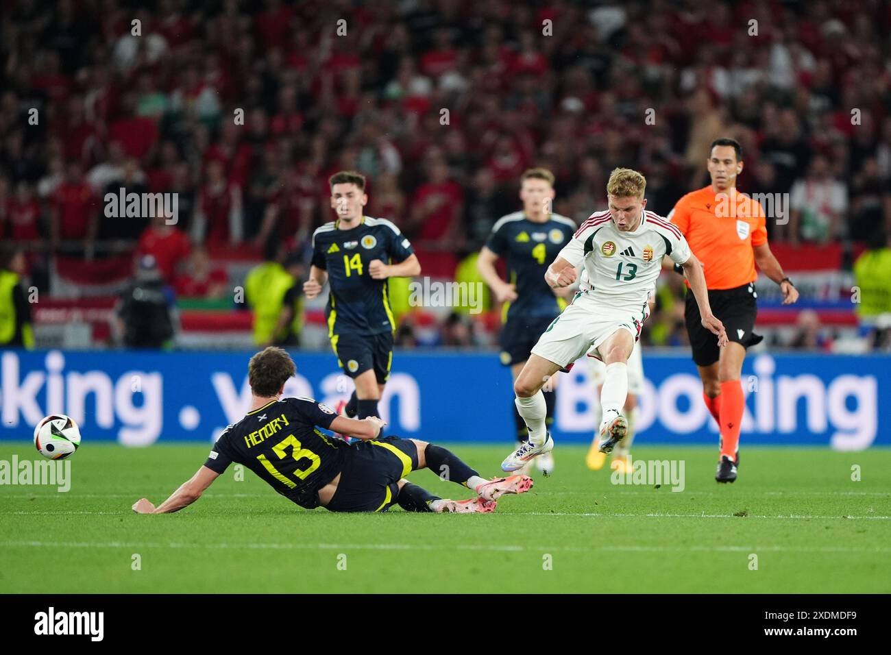 Hungary's Andras Schafer fouls Scotland's Jack Hendry (left) and is ...