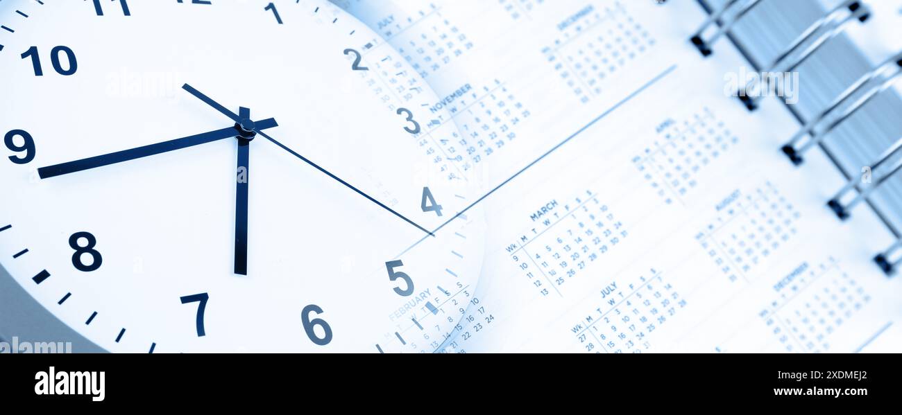 Clock face and calendar diary page Stock Photo - Alamy