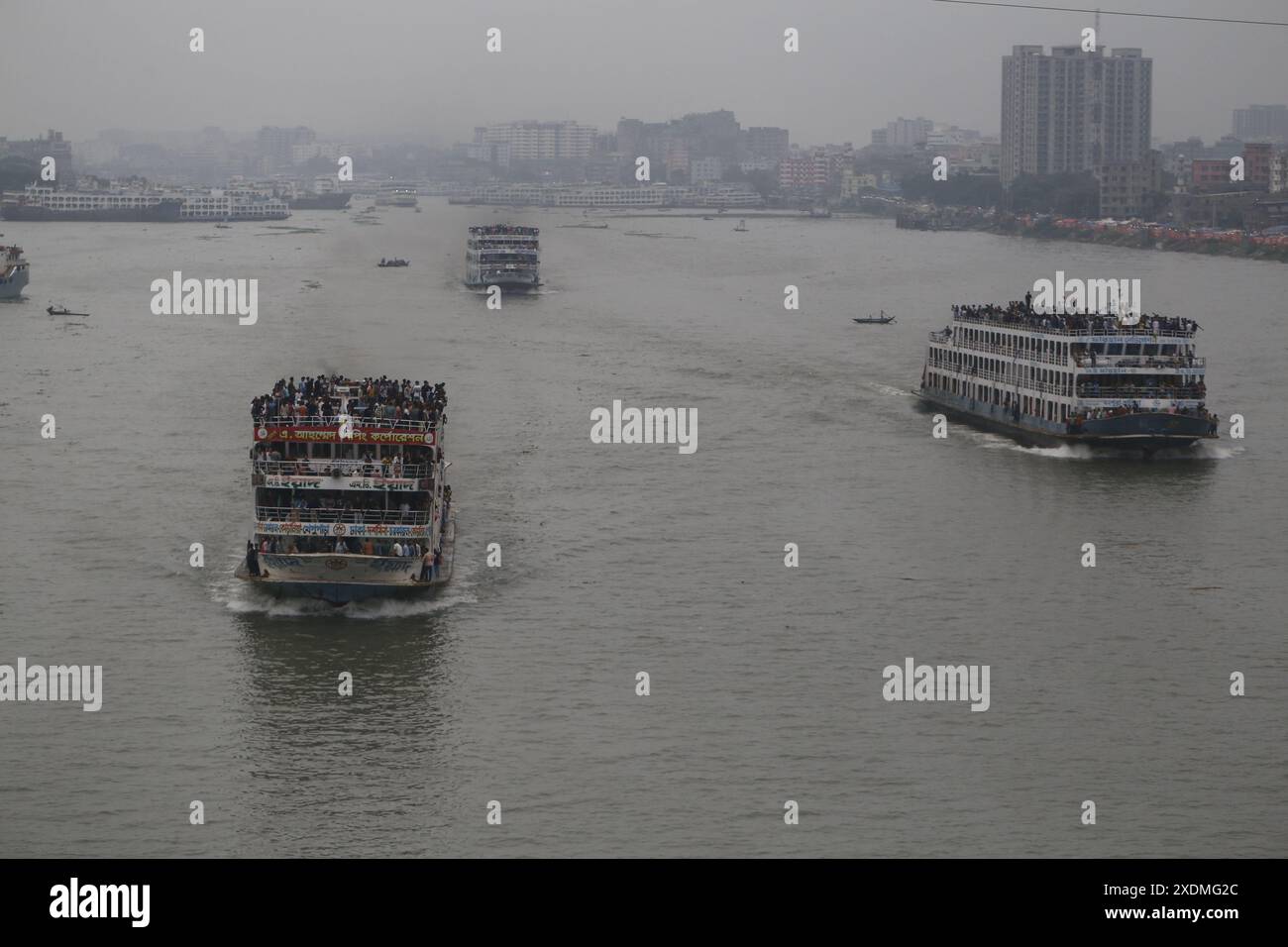 People travel on overcrowded ferries as they go home to celebrate the ...